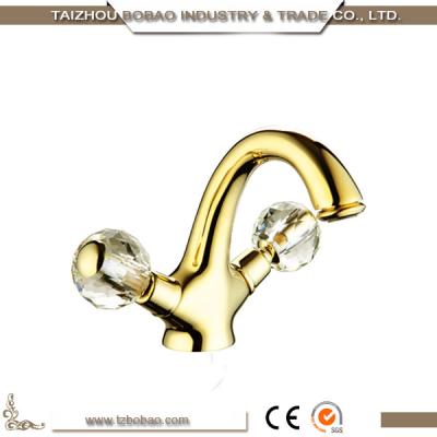 China Competitive Price Classic Design Gold Brass Dual Handle Faucet Basin Tap With Good Braided Hose for sale