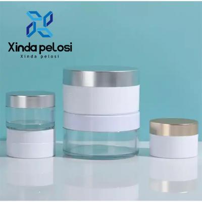 China Clear Transparent Cosmetic Containers Amber Glass Cream Jar With Gold Lid And Silver Cover for sale