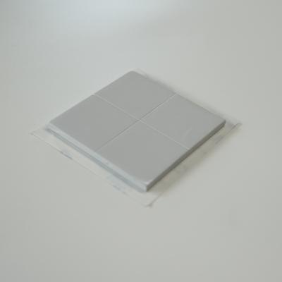 China Pads de silicone de condução térmica personalizados de alta gravidade específica e ampla faixa de temperatura à venda