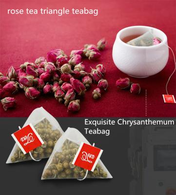 Cina Macchina imballatrice del triangolo di Rose Flower Teabag Packaging Machine della bustina di nylon del tè in vendita
