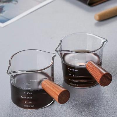 China 100 ml durchsichtige Borosilikat-Glas-Messbecher mit Deckel minimalistischer Designart zu verkaufen