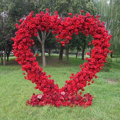 Cina Giornata della mamma Arco di fiori a forma di cuore Stand per ristorante Bar Hotel Decorazione di matrimonio in vendita