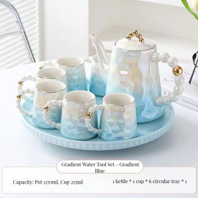 China Modern and Eye-catching Trendy Shell Design Pink Pearl Ceramic Mug with Bamboo Saucer for sale