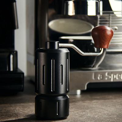 China 48mm Ceramic Flat Burr Set Cordless Manual Coffee Grinder for Modern and Retro Lovers for sale