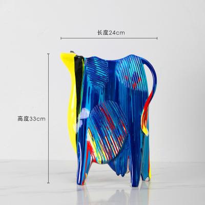 China Vintage Galloping Horse Resin Sculpture in Camouflage Design for Desktop Wall Decor Bamboo Material for sale