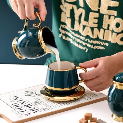 Cina Europa sostenibile Disegno rotondo con bordo in oro in rilievo Ceramica Acqua Tè Latte Tazze in vendita