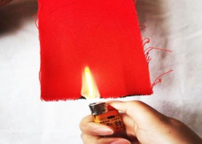 Cina 240-245gsm Twill Flame Retardant Fabric Non Flammable Oil Water Resistant Fabric Red in vendita