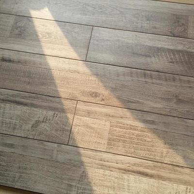 China HDF AC3 Class31 12mm 150mm high glossy U groove laminate flooring for sale
