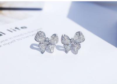 Cina Il platino Diamond Bow Stud Earrings 0.10ct CONTRO chiarezza 4.5gram ha personalizzato in vendita