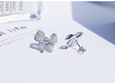 Cina Il platino Diamond Bow Stud Earrings 0.10ct CONTRO chiarezza 4.5gram ha personalizzato in vendita