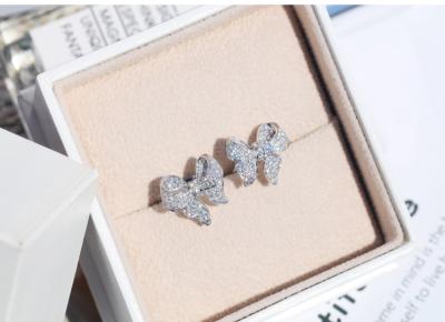 Cina Il platino Diamond Bow Stud Earrings 0.10ct CONTRO chiarezza 4.5gram ha personalizzato in vendita