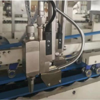 Cina Facile da utilizzare Sistema di applicazione di colla chimica a freddo per la macchina di incollazione della carta in vendita
