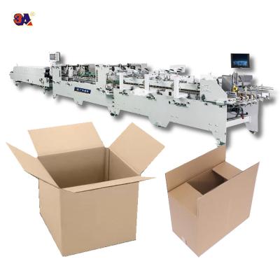 Cina PLC controllato CQT1300 Colla a velocita' automatica per cartoni ondulati e cartoni in vendita