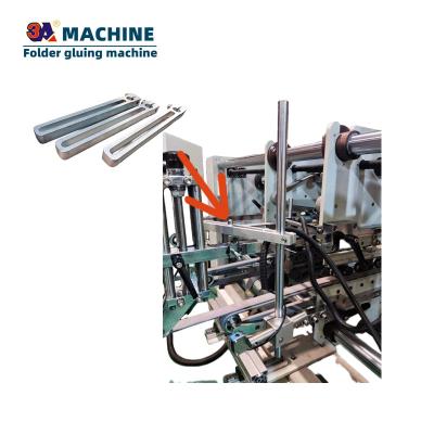 China 1.0 Acessórios de máquinas de colagem automática de caixa dobrável para colagem de caixa e suporte de montagem à venda