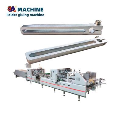 China 1.0 Acessórios de máquinas de colagem automática de caixa dobrável para colagem de caixa e suporte de montagem à venda