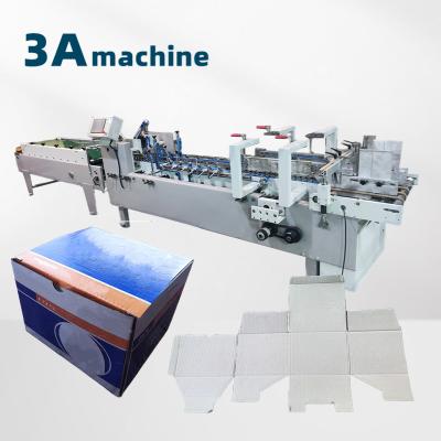 Cina 1100 Modello Automatico 46 Corner Folder Gluer Press Semi Auto Folder Gluer Machine con PLC in vendita