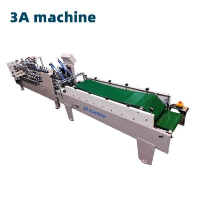 Cina Macchina di incollaggio per cartoni automatici per consegne tempestive e dimensioni di scatola adatte in vendita