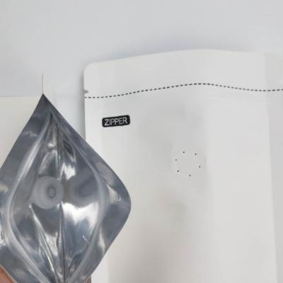China OEM Custom 1/8 OZ White Logo Size Resealable Aluminum Foil 120 Microns Kraft Paper Stand Up Packaging Pouches for sale