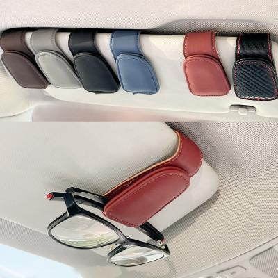China Portable Sunglasses Holders Pu Leather Eyeglass Hanger Clip Magnetic for Car Ticket Auto Interior for sale
