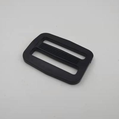 中国 注文のロゴ24.7mmのプラスチック止め金のバックル1はTriglidesのプラスチック スライドをじりじり動かす 販売のため