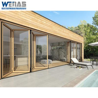 China Wind Resistant Thermal Break Aluminium Bi Fold Doors Heavy Duty for sale