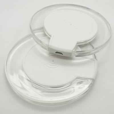 China the newest mini Qi wireless charger plate power bank for smartphome charger for sale