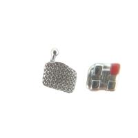 China Certification CE DTC MIM Technology Orthodontic Brackets with Mesh Base Braces 3W/Hook for sale
