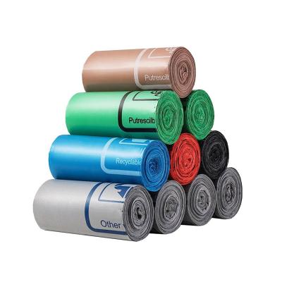 Cina Materiali riciclati sigillo stellare PE sacchetti di spazzatura di plastica su rotolo per una vita ecologica in vendita