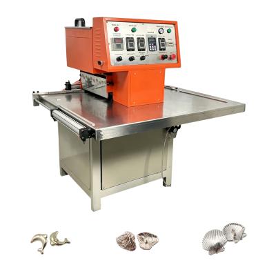 China Full Automatic Centrifugal Casting Machine Metal Alloy Casting Equipment for Ocean Style Alloy Buttons for sale