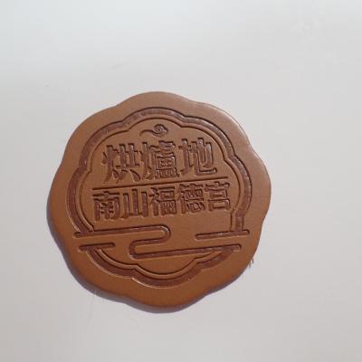 China Embossed Brown Jean Leather Patch Black Logo Label For Clothes for sale