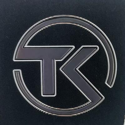 China Nuevo diseño Logotipo TPU personalizado Prensa de calor de bajo MOQ Trackpant TPU Logotipo de transferencia de calor TPU Proveedor de transferencia de calor para uso en prendas de vestir en venta