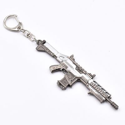Cina Steelseries Apex Pro Mekanik Gaming Metal Gun Keychain APEX Hero Hemlock Assault Gun Model in vendita