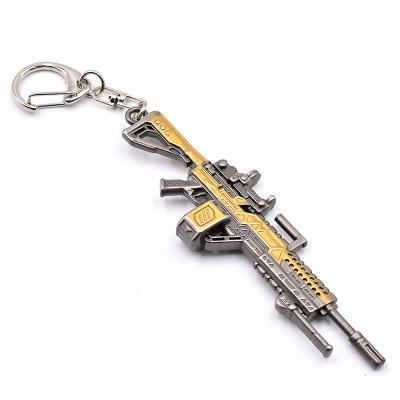 中国 11cm Metal Keychain Gun Props In The Game APEX Hero Focus Light Machine Gun Model Toy 販売のため