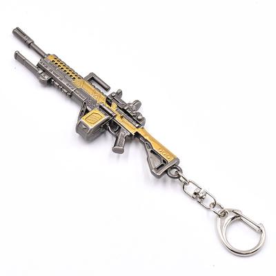中国 11cm Metal Keychain Gun Props In The Game APEX Hero Focus Light Machine Gun Model Toy 販売のため