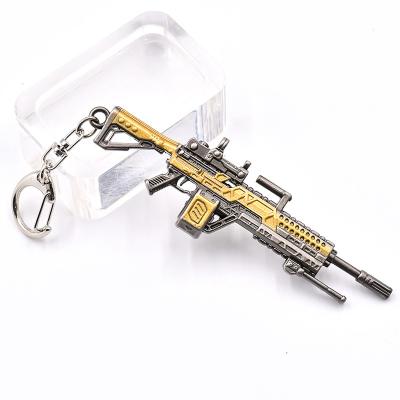 中国 11cm Metal Keychain Gun Props In The Game APEX Hero Focus Light Machine Gun Model Toy 販売のため