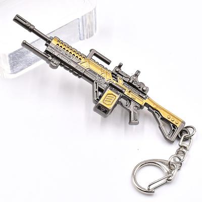 中国 11cm Metal Keychain Gun Props In The Game APEX Hero Focus Light Machine Gun Model Toy 販売のため