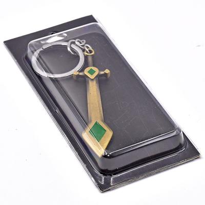 Cina Spada su ordinazione del carattere di GRASSA RISATA, colata del metallo, catena chiave del mini metallo delle azione di ripristino del dettaglio in vendita