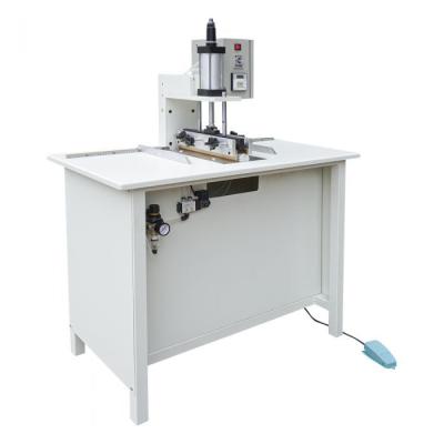 China HX700CBR Hardcover Case Back Rounding Machine pneumatically rounds spines with heated molds and easy manual feeding for sale