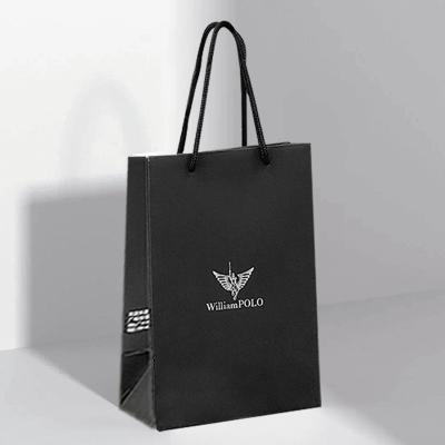 China Customized Collapsible Recycled Paper Gift Bags Boutique Paper Bags With Handles for sale