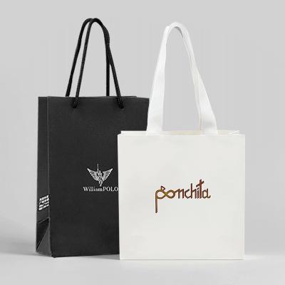 China Custom White Black Paper Plain Paper Bags For Dresses Shopping With Your Own Logo Printed for sale