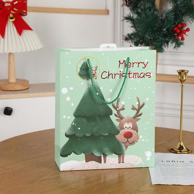 China Eco-Friendly Green Paper Bags Recycled Christmas Paper Bags  Sustainable Holiday Gift Packaging Solutions for sale
