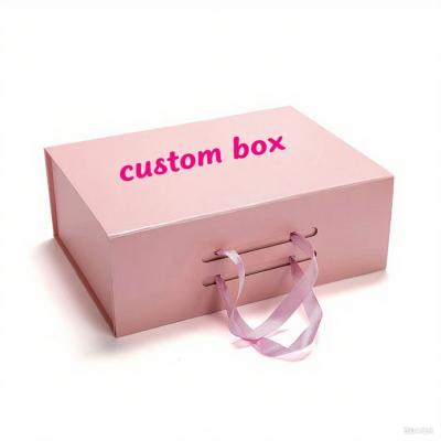 China Luxury Pink Printed Magnetic Gift Boxes Ribbon Handle Custom Logo Rigid Cardboard Packaging For Clothing for sale