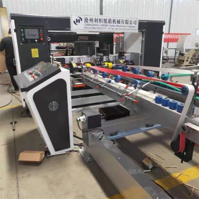 Cina Colla di cartone automatica per la cucitura di scatole di cartone 13T Peso netto per soddisfare le esigenze dei clienti in vendita