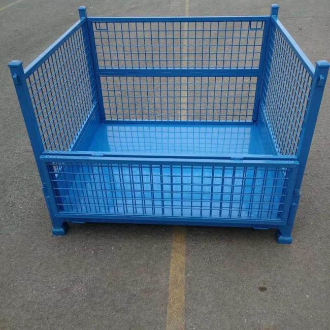 Multiple stacked wire mesh containers in warehouse setting