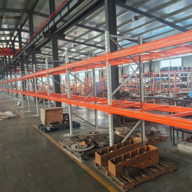 Heavy-duty pallet rack shelves with orange finish