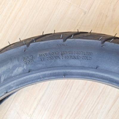 Cina 14 ruote Pneumatici per moto 80/90-14 per il porto di carico Porto di Qingdao e involucro dei pneumatici in vendita
