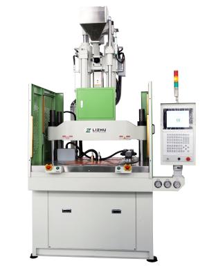 China Máquina de moldagem por injeção de mesa giratória de duas estações de corrediça dupla vertical de baixa pressão à venda
