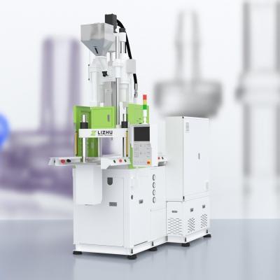 Cina PVC 6000 grammi macchina per lo stampaggio ad iniezione ad alta efficienza macchina per lo stampaggio a iniezione verticale da 50 tonnellate in vendita