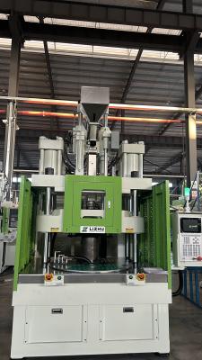 Cina Macchina per lo stampaggio a iniezione verticale di costruzione durevole con tavolo rotativo di LIZHU in vendita