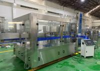 China 3 in 1 Gravity 7000 BPH Automatic Water Filling Machine for PET Bottles 330-1500ml for sale